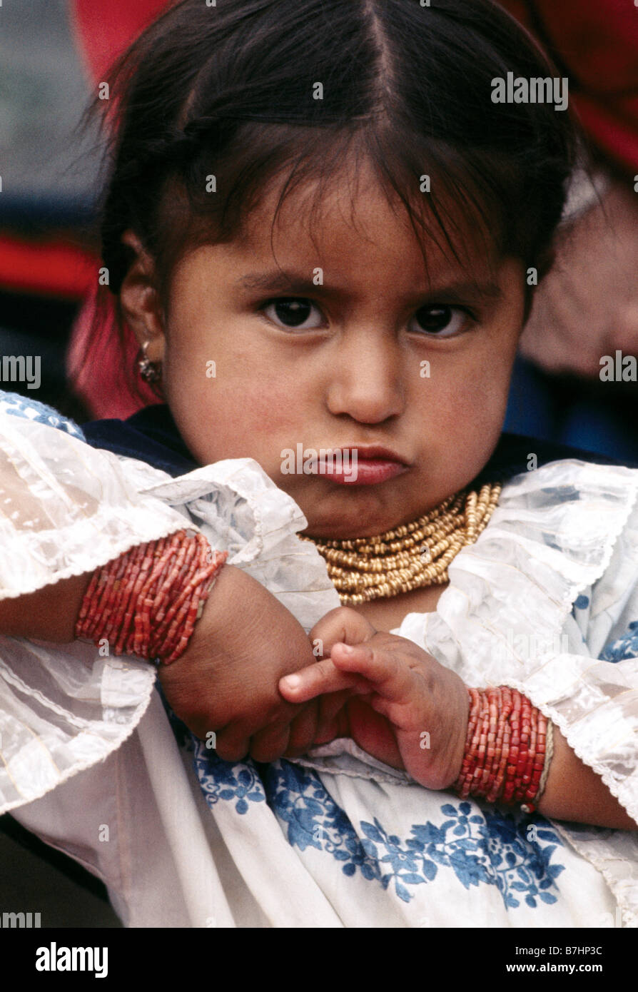 Native Indian girl at market near Equator in Ecuador Stock Photo - Alamy