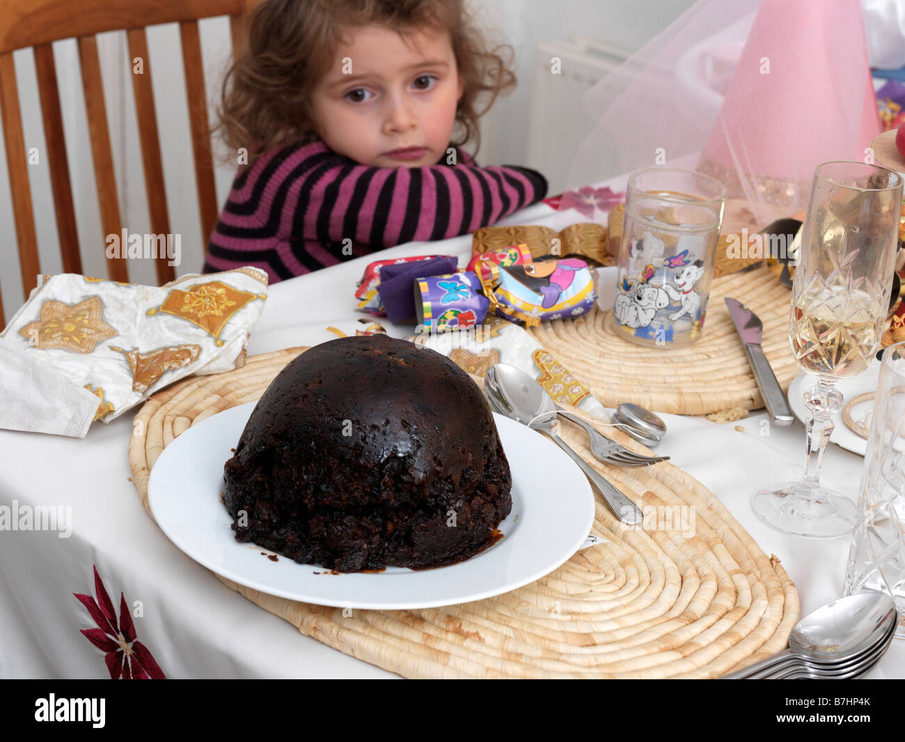 Child Looking at a Christmas Pudding Stock Photo - Alamy