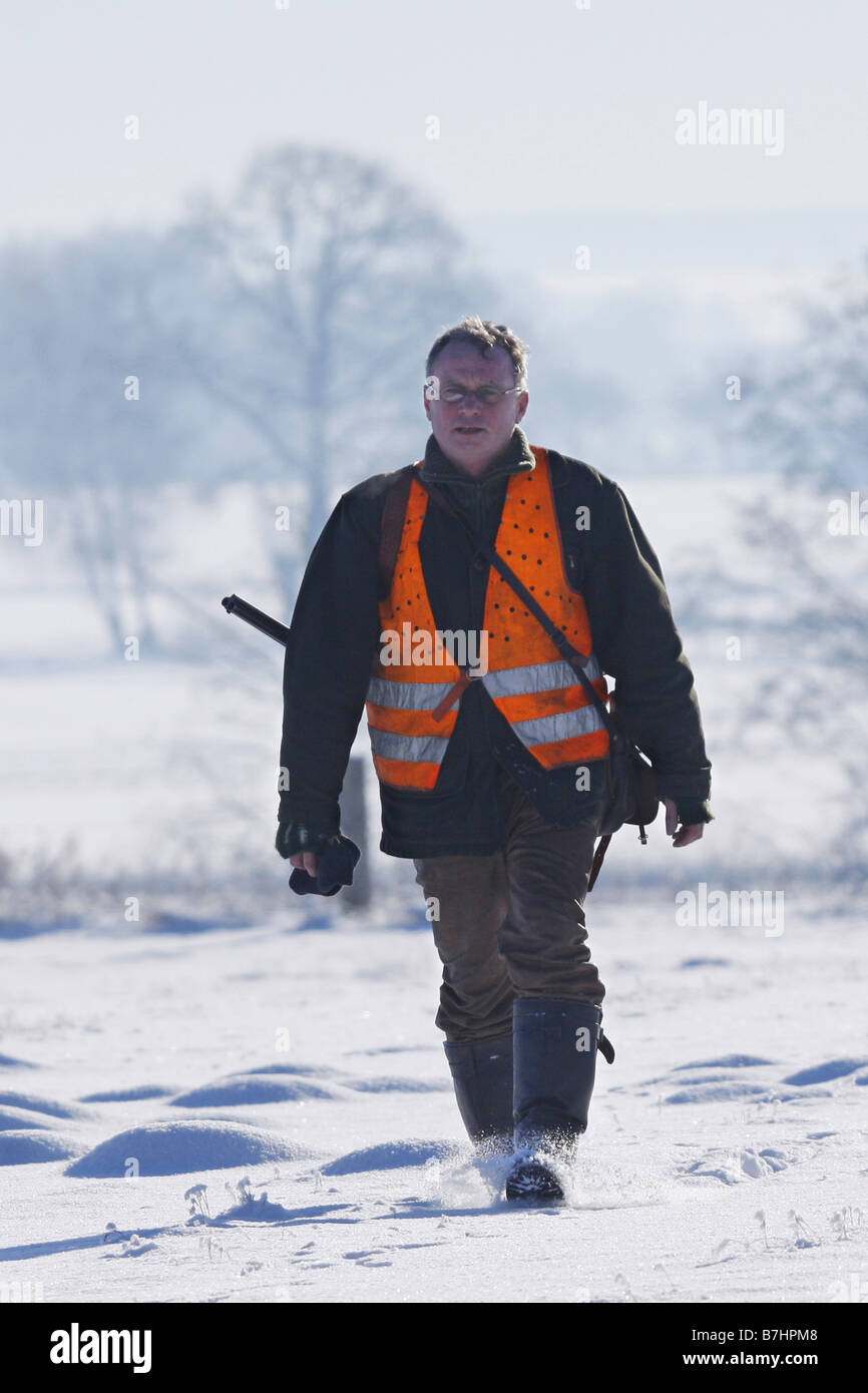 hunter in snow, Germany Stock Photo - Alamy