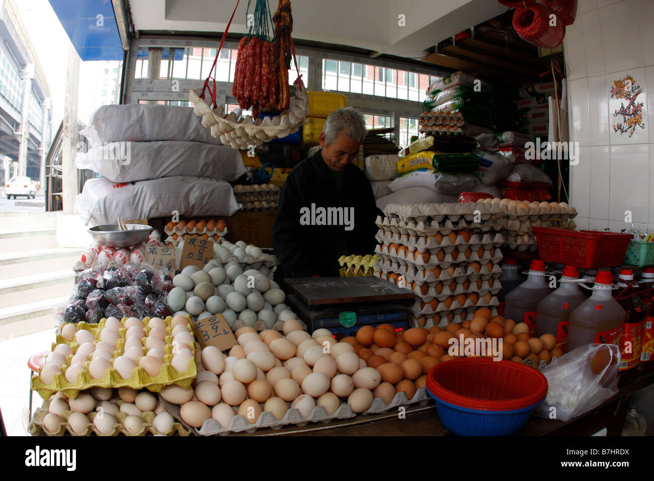 Local Egg seller in Chinese market Guangzhou China Stock Photo - Alamy