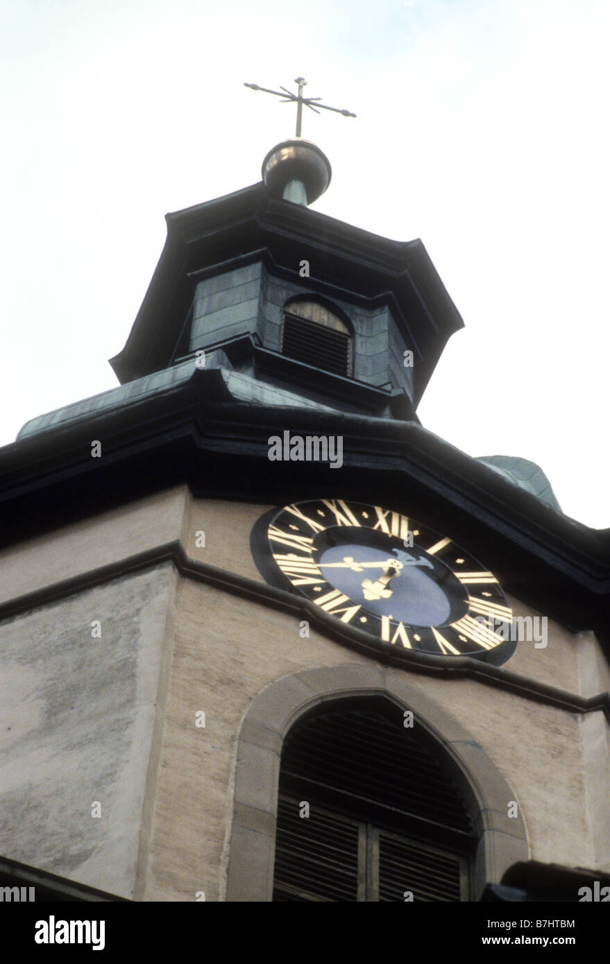 Church tower with clock in European city Stock Photo - Alamy