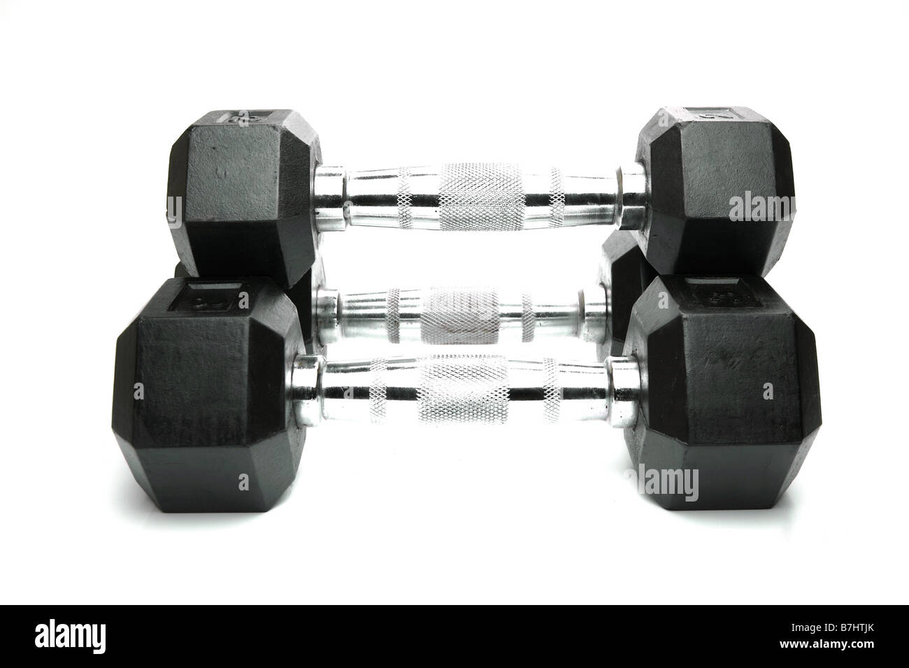 Weight lifting dumbbells isolated against a white background Stock ...