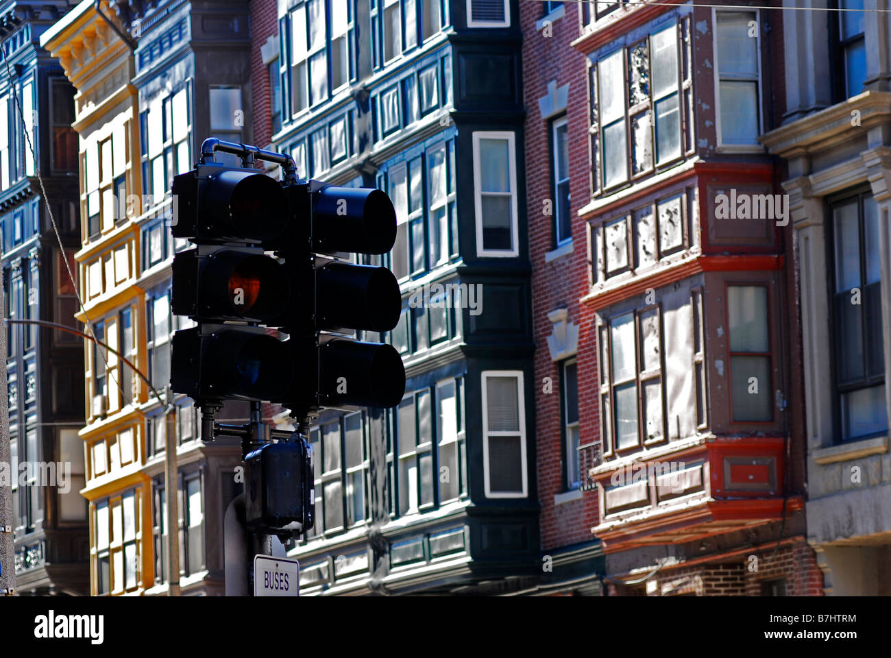 a traffic signal and buildings Stock Photo - Alamy