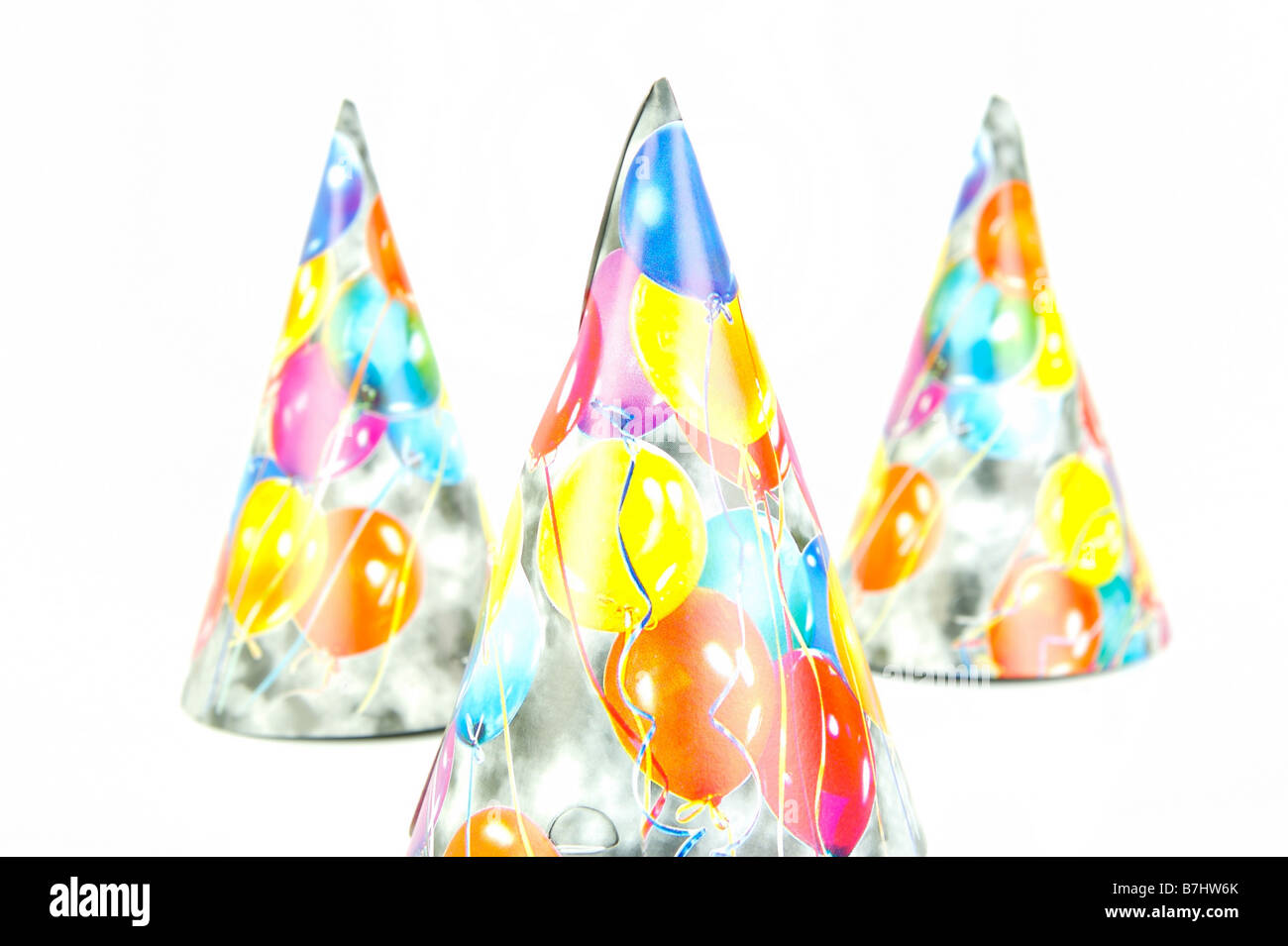 Party hats isolated against a white background Stock Photo - Alamy