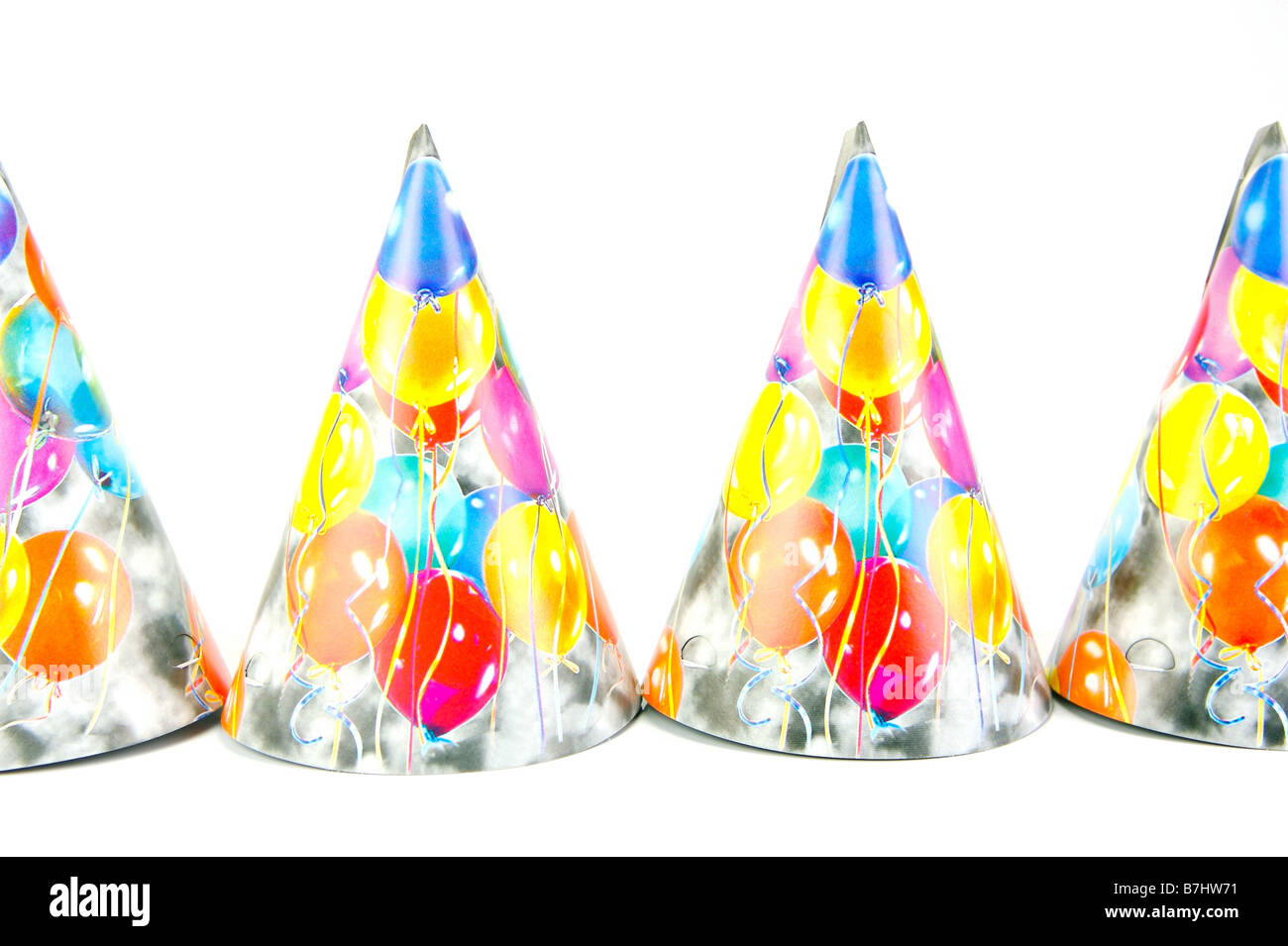 Party hats isolated against a white background Stock Photo - Alamy