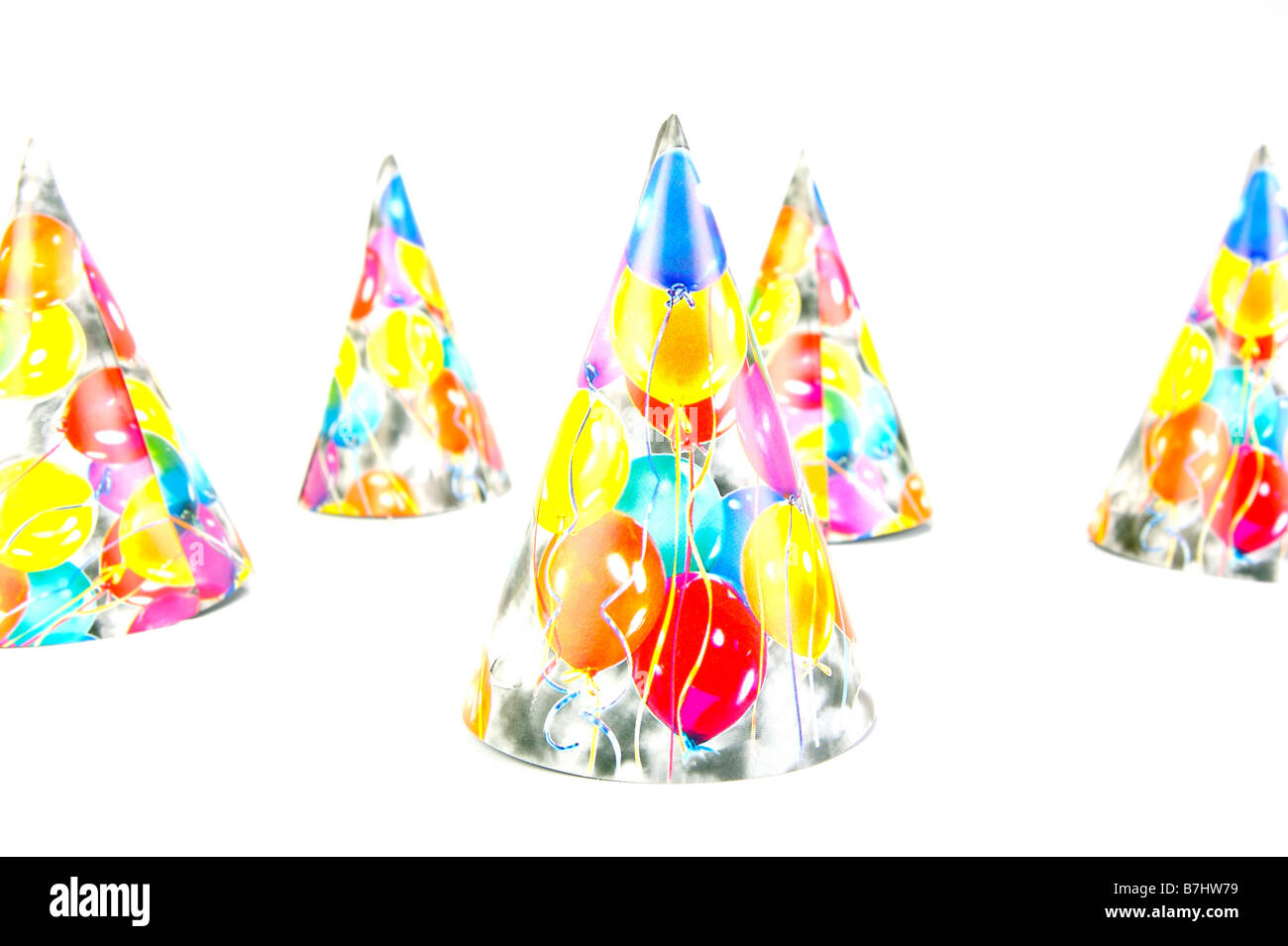 Party hats isolated against a white background Stock Photo - Alamy