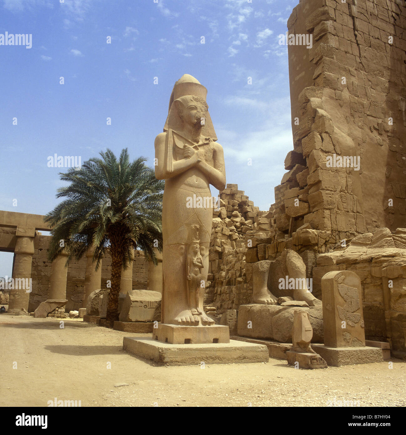Statue of the Pharaoh Rameses II at the massive temple complex at ...