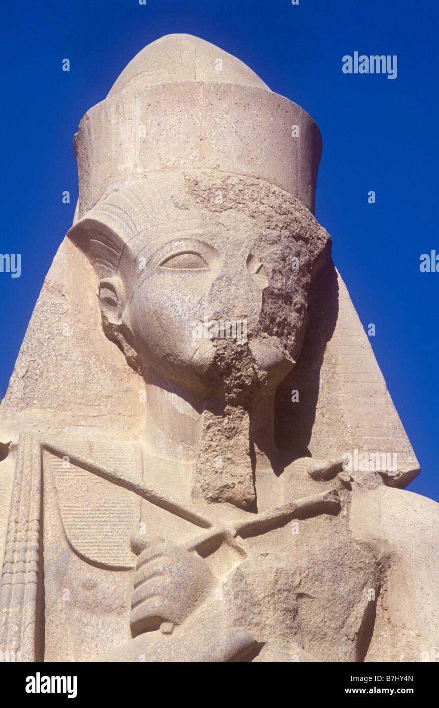 Statue of the Pharaoh Rameses II at the massive temple complex at ...