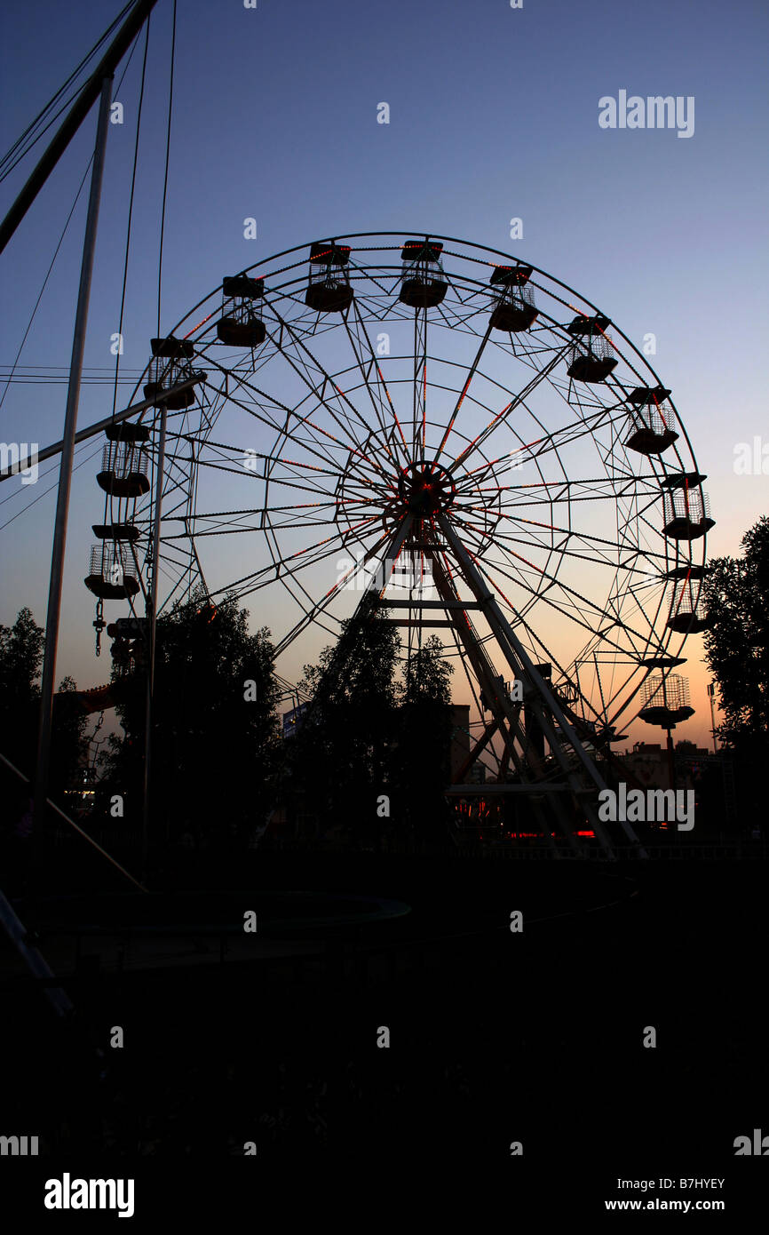 Carnival ferris wheel in kuwait city Stock Photo - Alamy