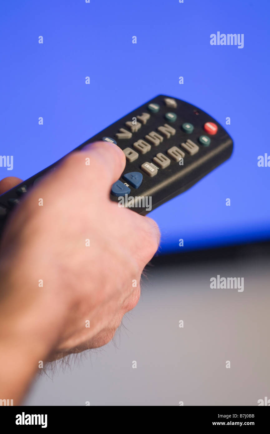 Channel changer and plasma TV, B.C Stock Photo - Alamy