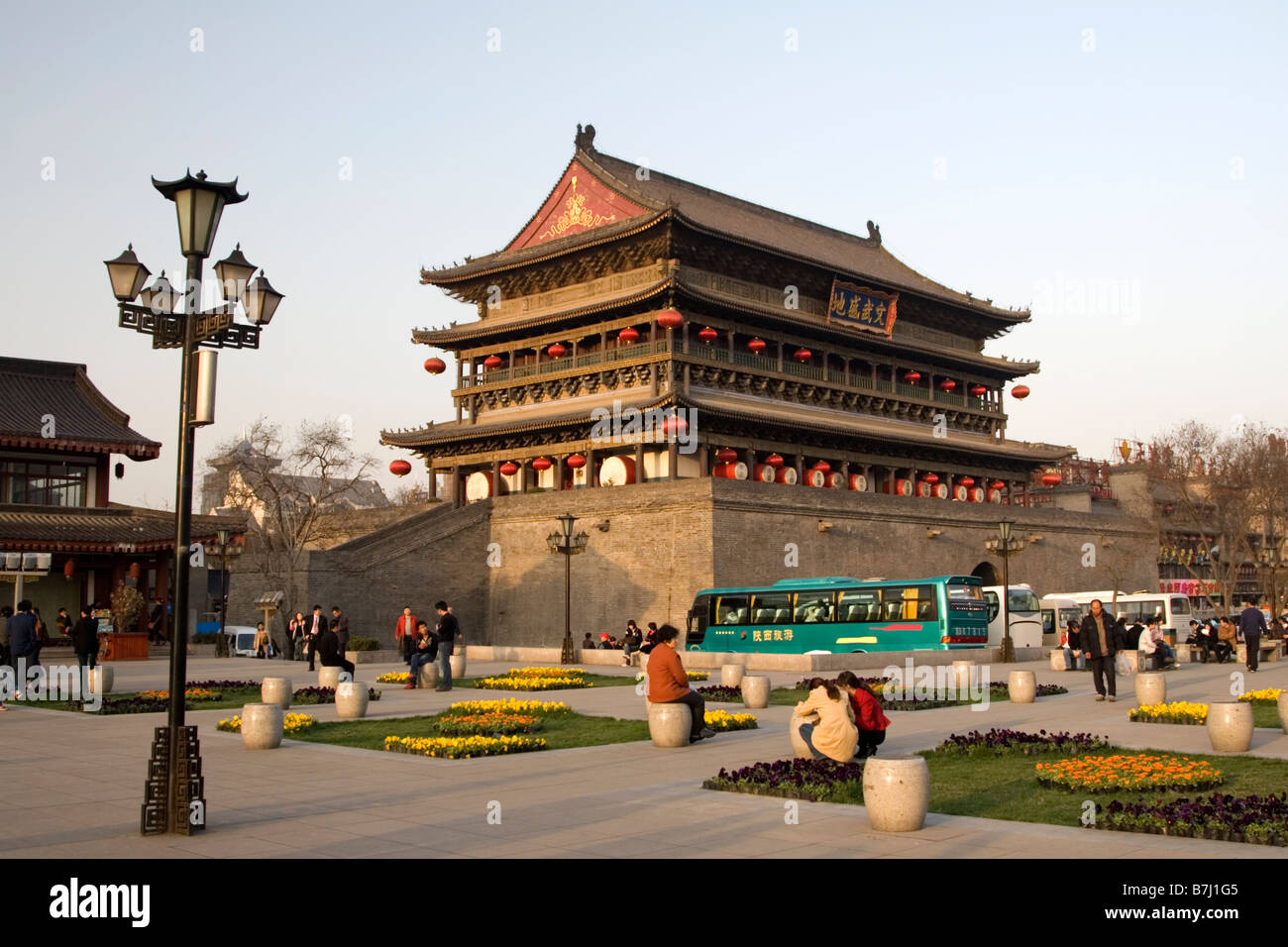 The Drum Tower an ornate historical tower presides over a large public ...