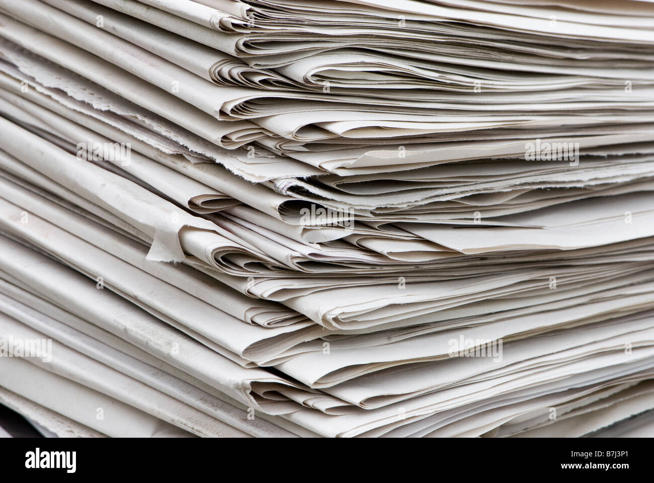 Stack of newspapers Stock Photo - Alamy