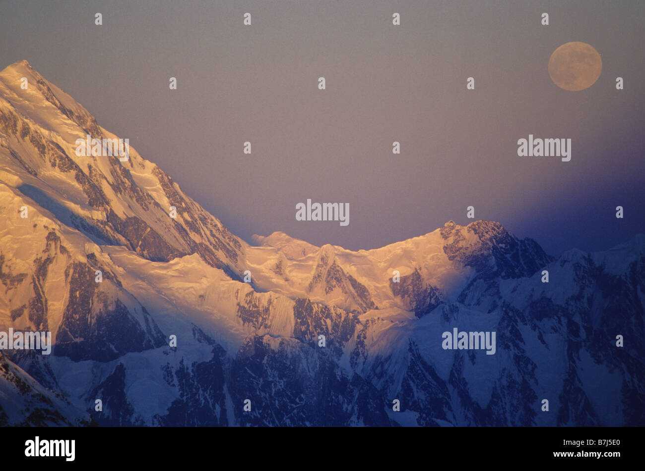 Full moon over snow capped hi-res stock photography and images - Alamy