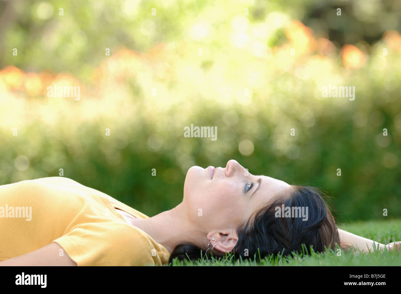 Woman laying down profile hi-res stock photography and images - Alamy