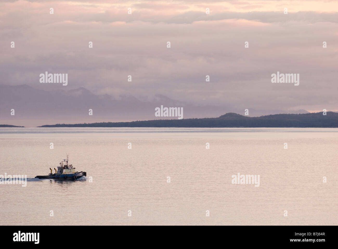 A Tugboat passes the Dallas Road Waterfront in Victoria, BC Stock Photo ...