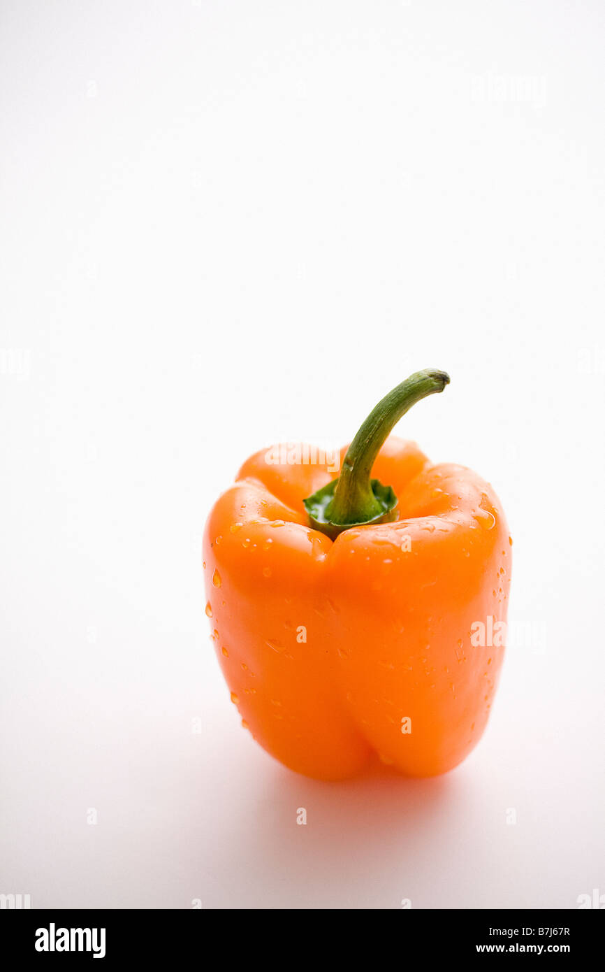 Single orange pepper Stock Photo - Alamy