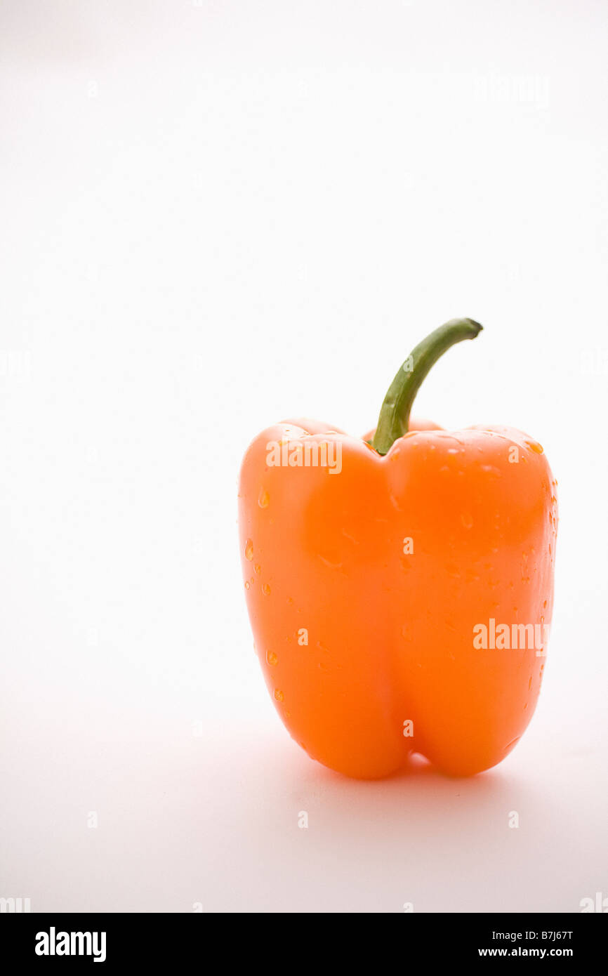 Single orange pepper Stock Photo - Alamy