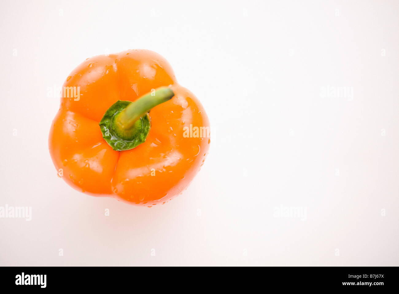 Single orange pepper, from above Stock Photo - Alamy