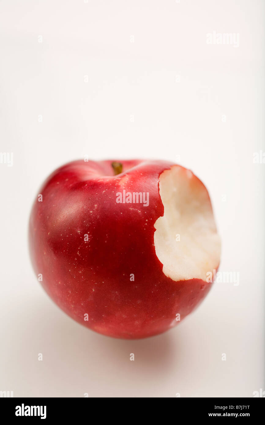 Organic apple with bite taken out Stock Photo - Alamy