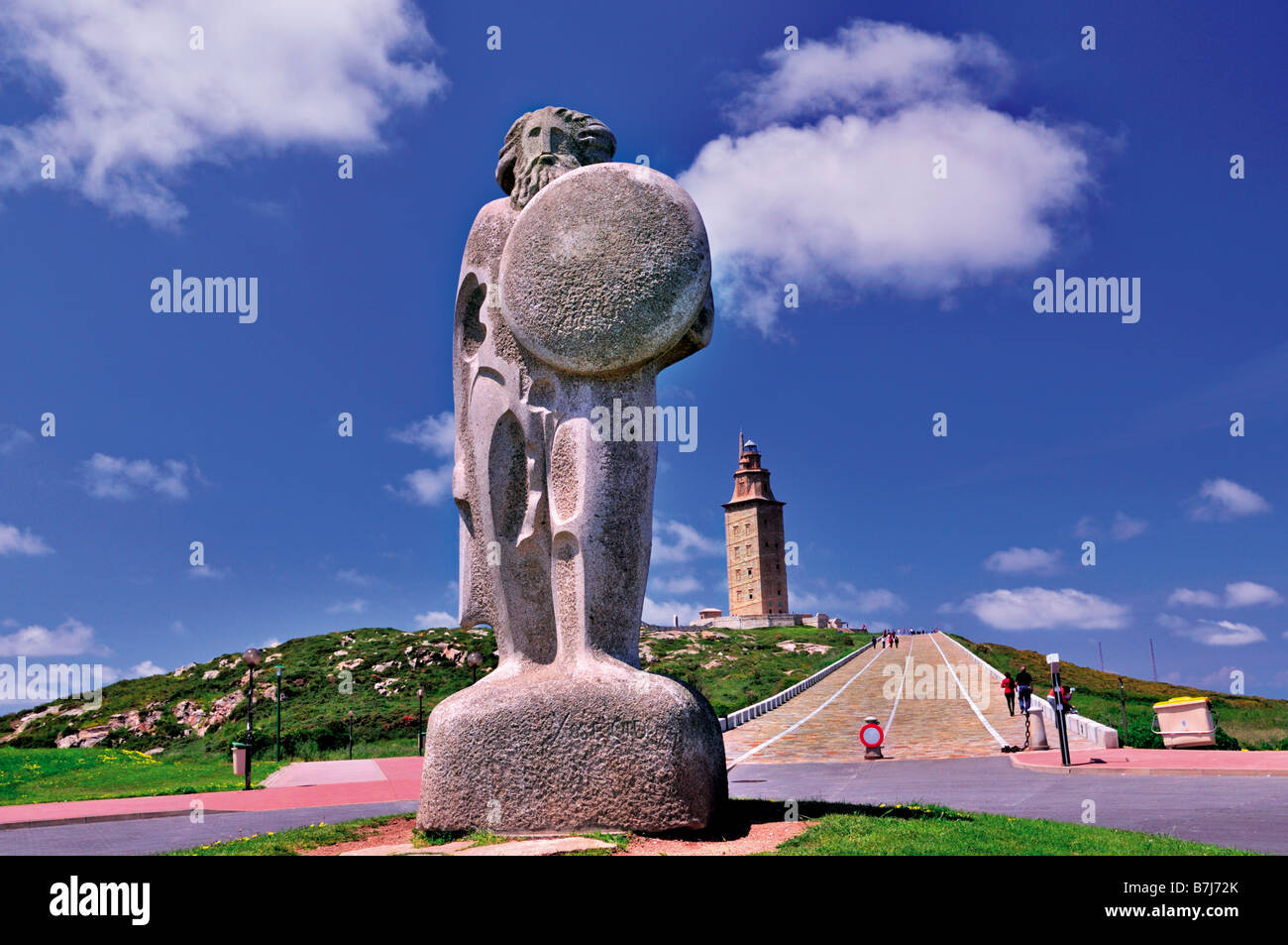 Statue of Breogán in the foreground and the roman Tower of Hercules in ...
