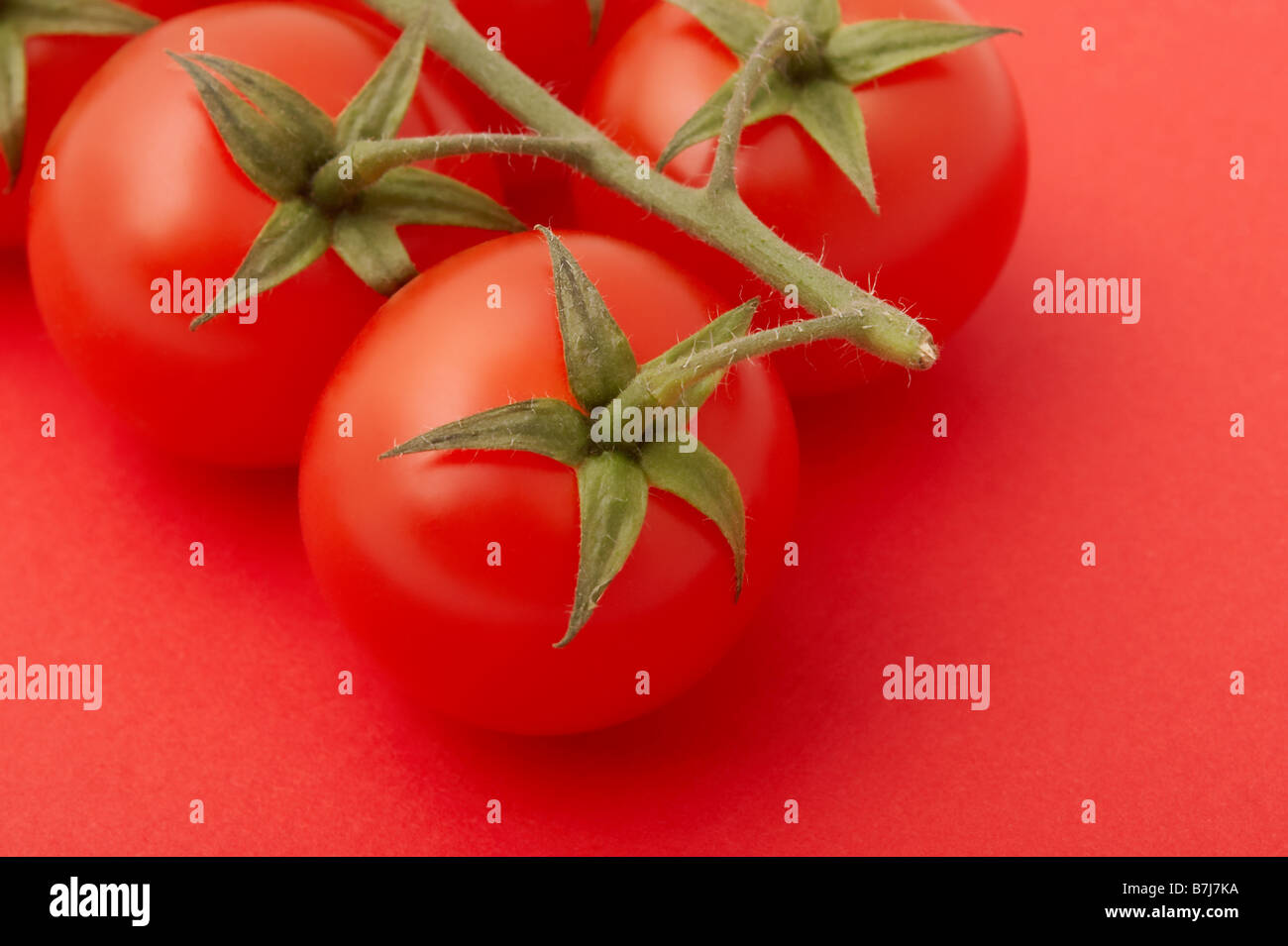 Three Red Tomatoes Stock Photo - Alamy