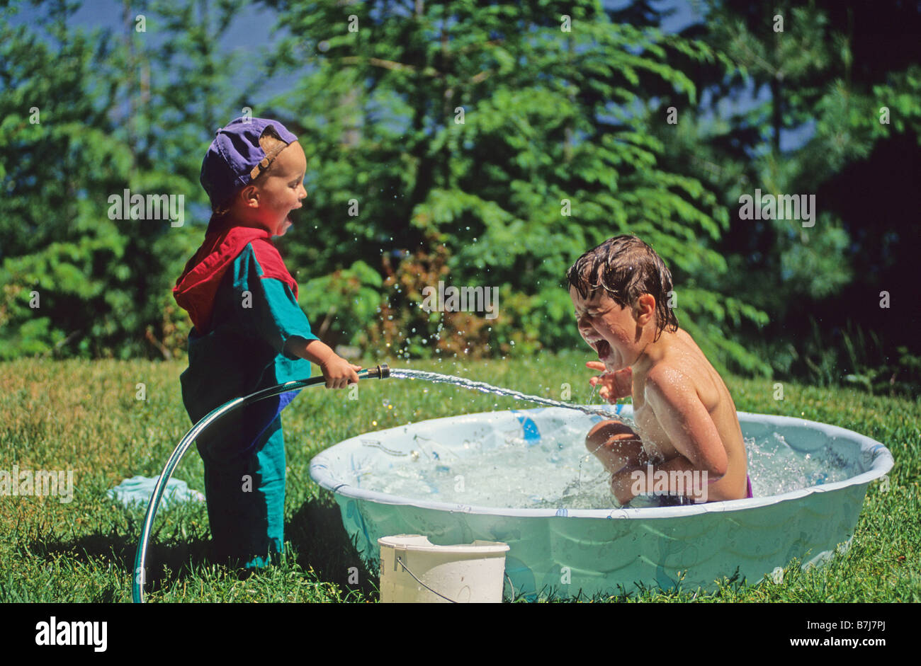 Girl 3 year old playing grass outdoors hi-res stock photography and ...