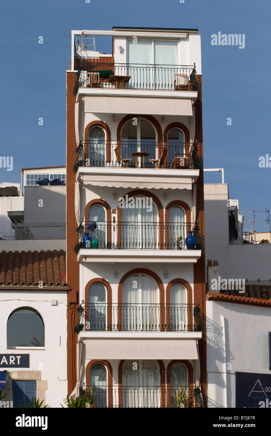 Traditional Catalan architecture buildings by the sea front. Sitges ...