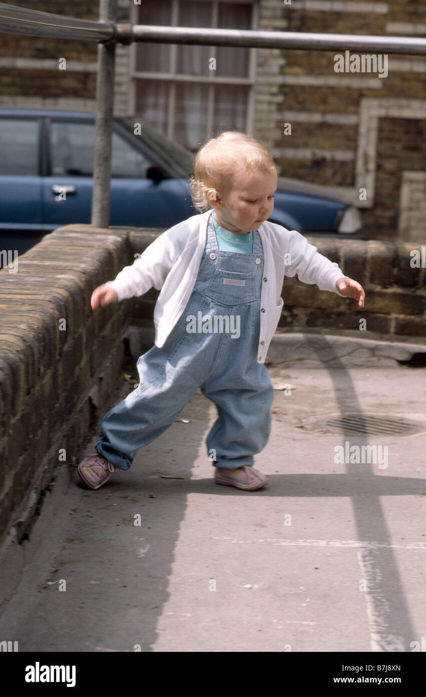 baby exploring first steps and running Stock Photo - Alamy