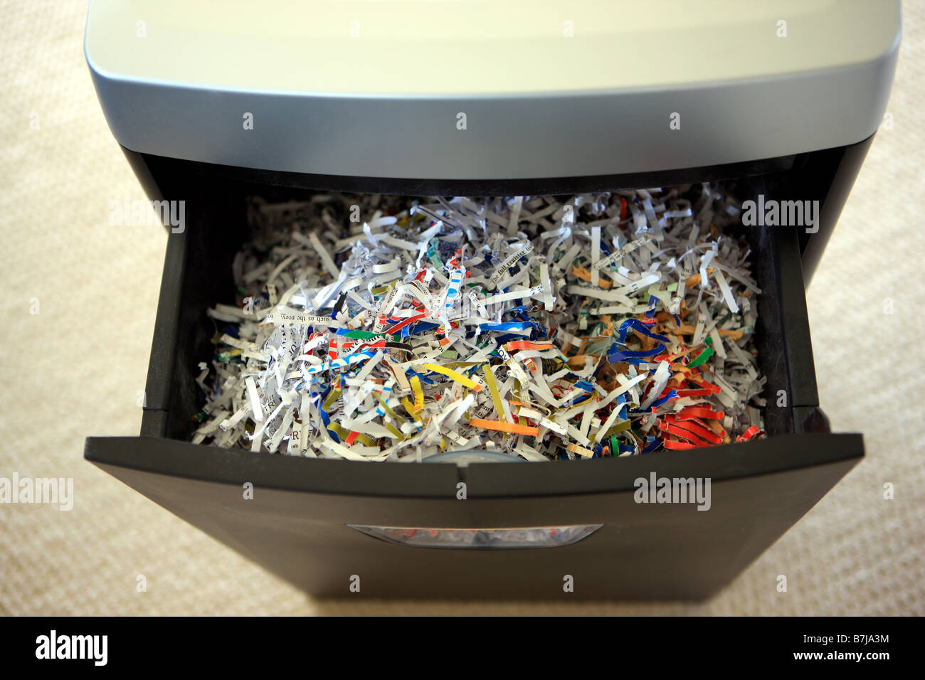 Paper shredder hi-res stock photography and images - Alamy