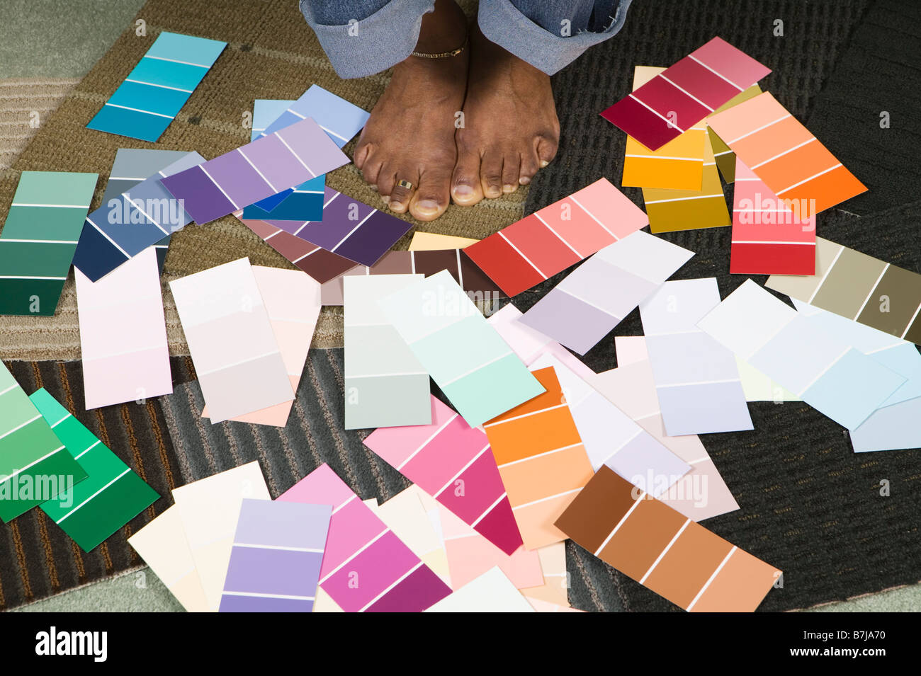 African American going over paint colour swatches, Vancouver, BC Stock ...
