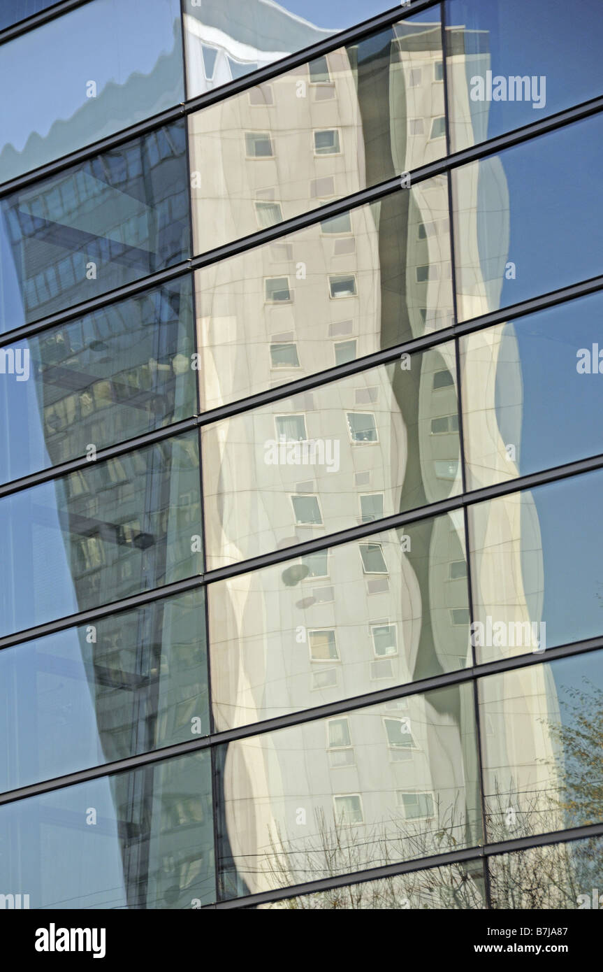 Tower block on Harvist Estate reflected in Arsenal s Emirates Stadium ...