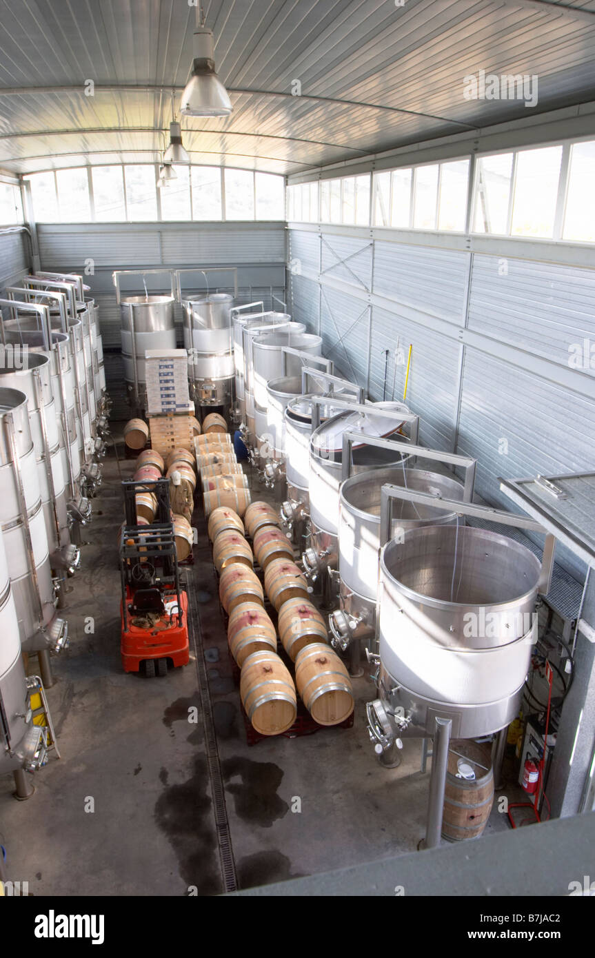 Oak barrel aging and fermentation cellar. Fermentation tanks. Mas ...