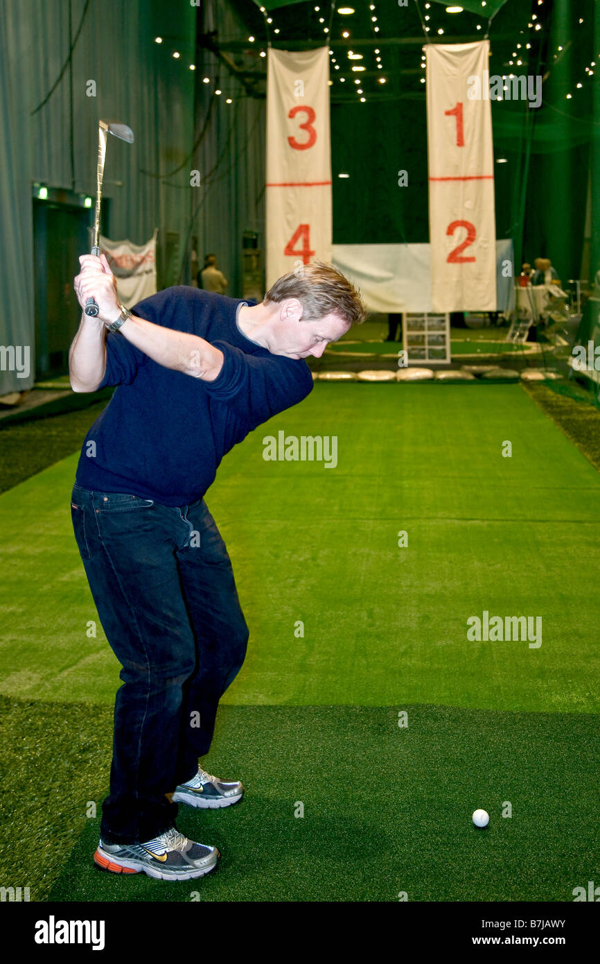 Indoor golf setup Stock Photo - Alamy