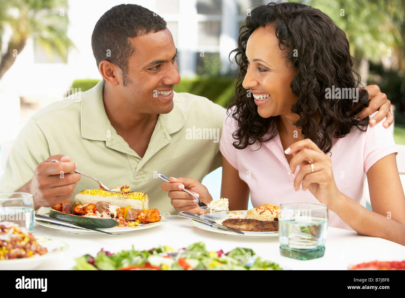 Couple Eating An Al Fresco Meal Stock Photo - Alamy