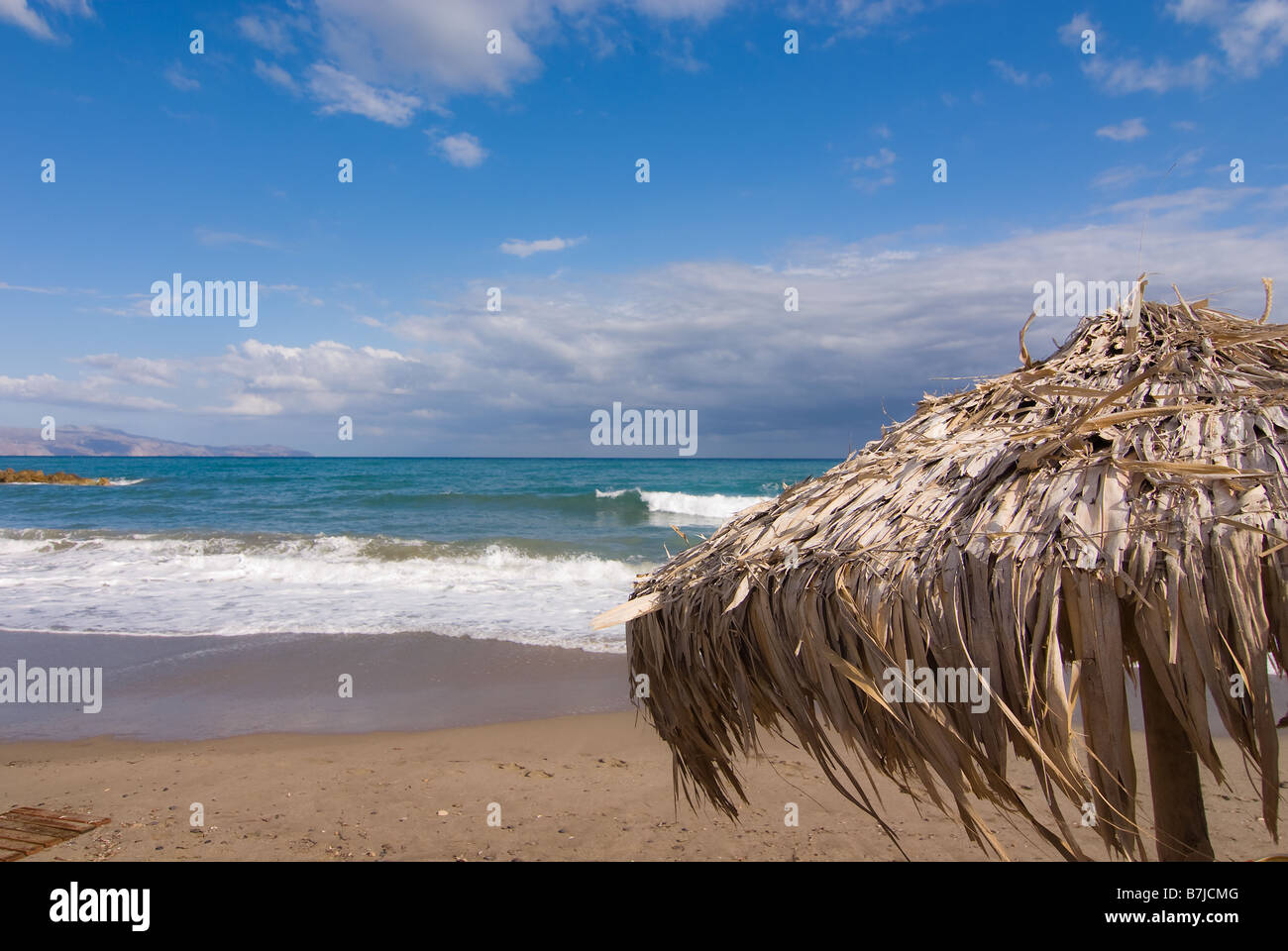bamboo parasolls at the Mediterranean beach Stock Photo - Alamy