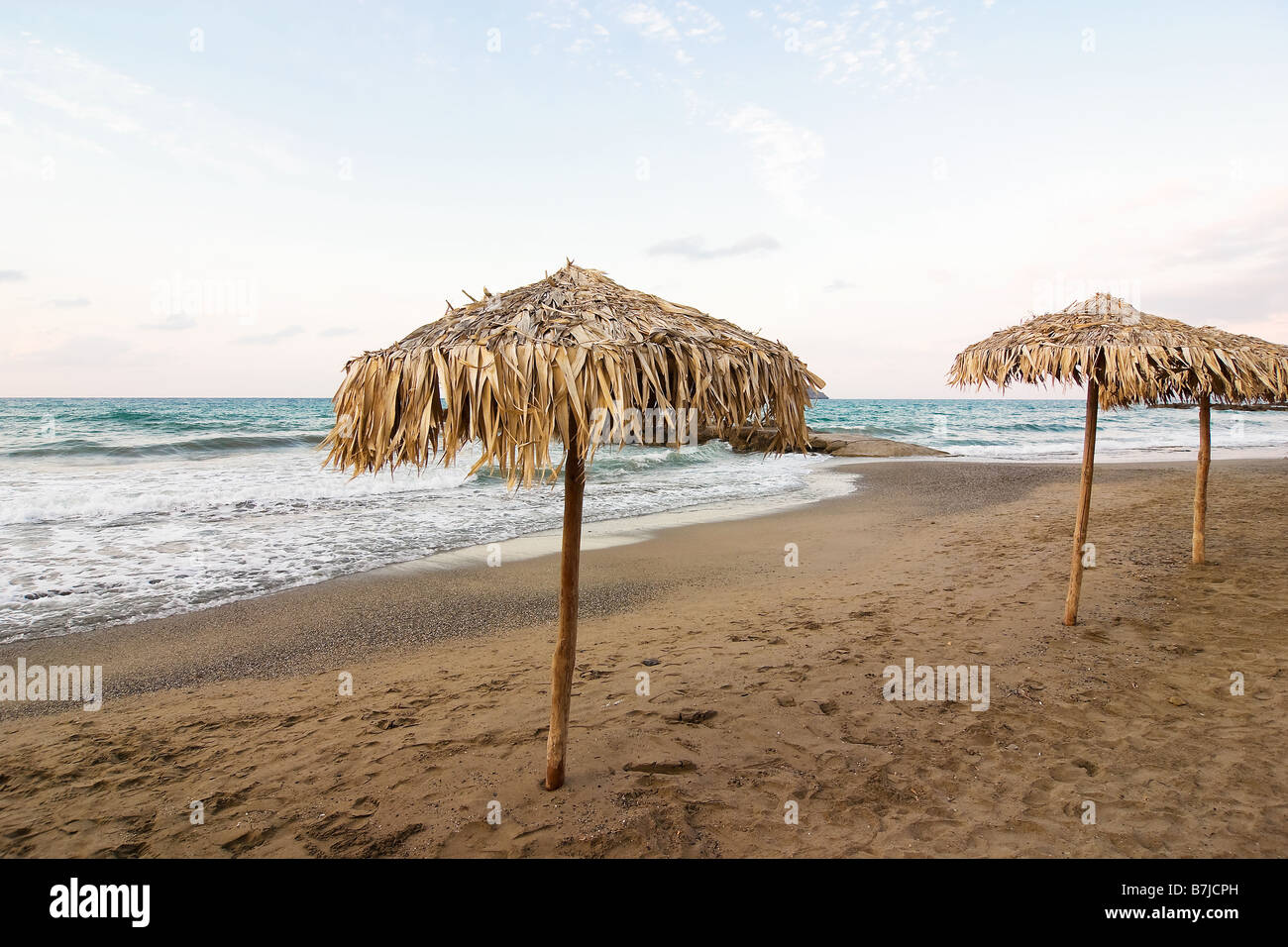 bamboo parasolls at the Mediterranean beach Stock Photo - Alamy
