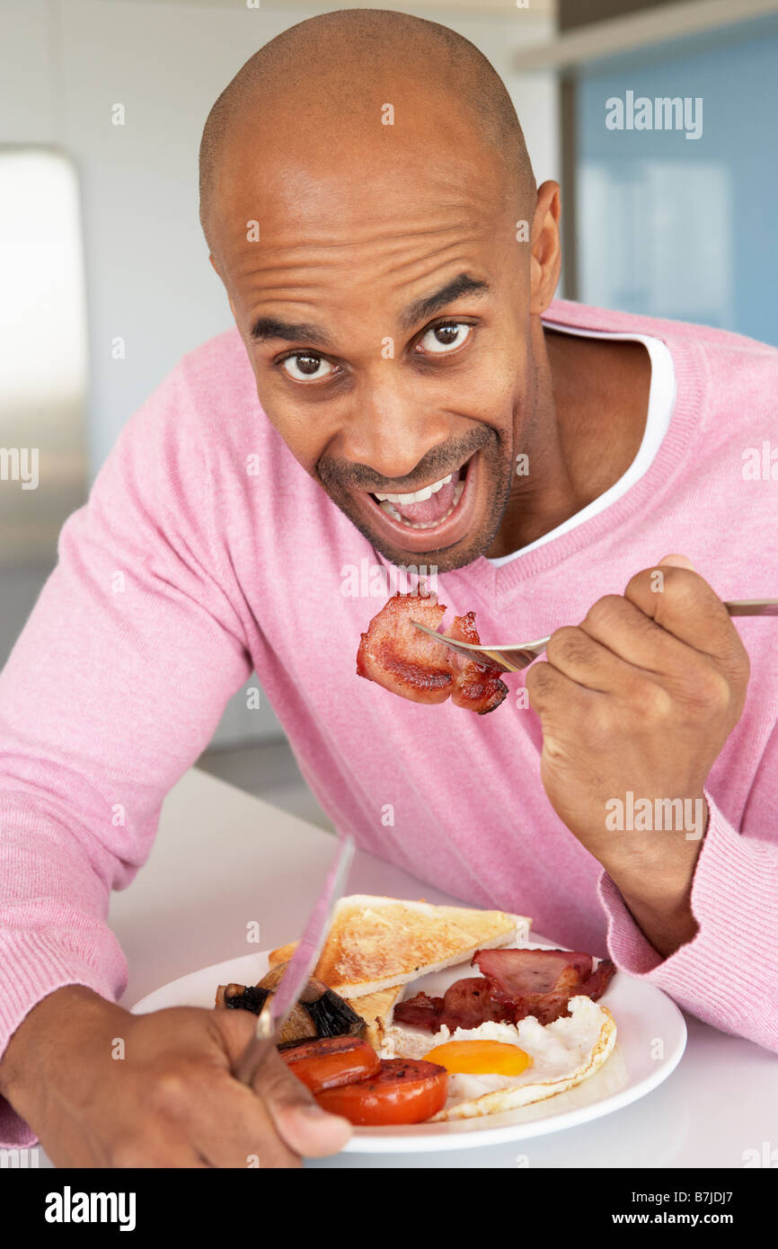 Man eating english breakfast hi-res stock photography and images - Alamy