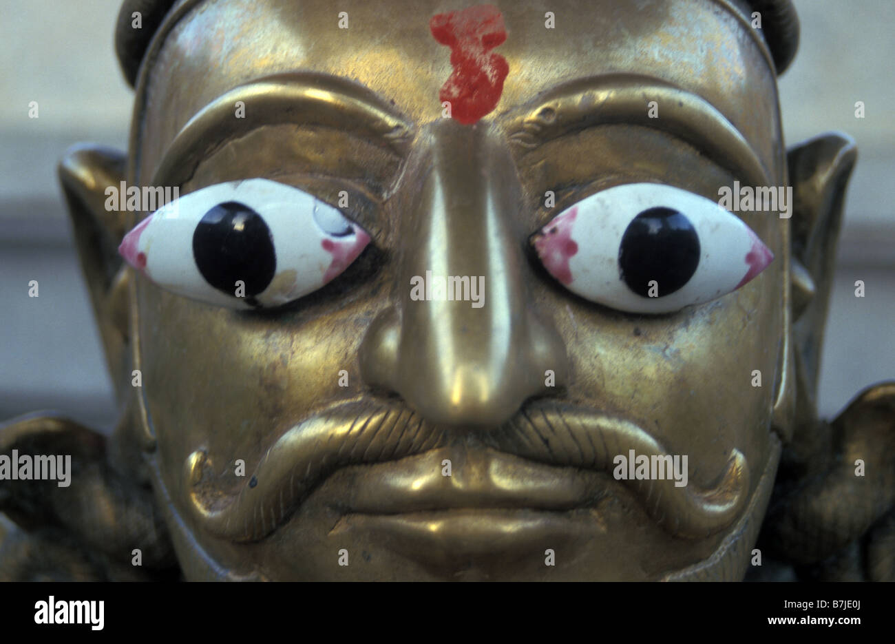 portrait of eyes and face of bronze Hindu statue of Vishnu Udaipur ...