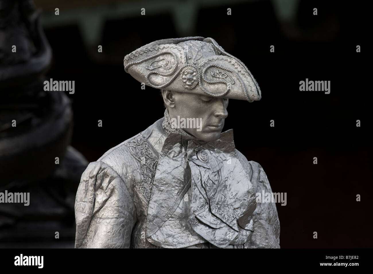 Street actor portraying a statue on the bank of the Thames Stock Photo ...