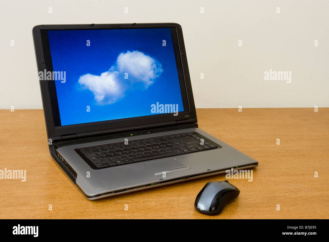 Laptop with a cloud picture Stock Photo - Alamy