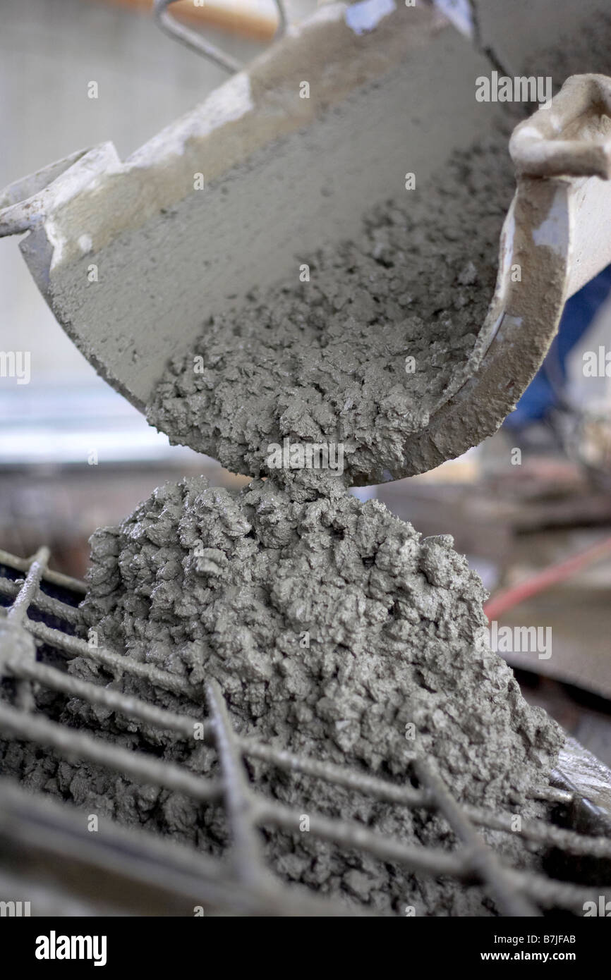 Cement pouring out of mixer; Canada, Ontario, Hamilton (Composting ...