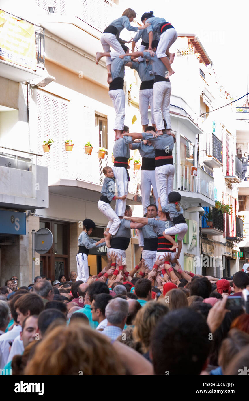 Human tower competition, castellers, Climbing up. Drawing big crowds ...