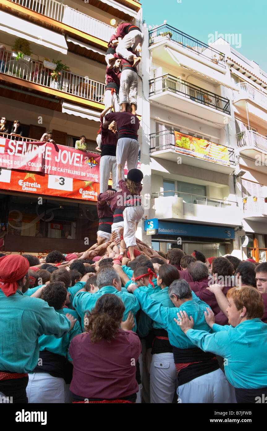 Human tower competition, castellers, Climbing up. Drawing big crowds ...