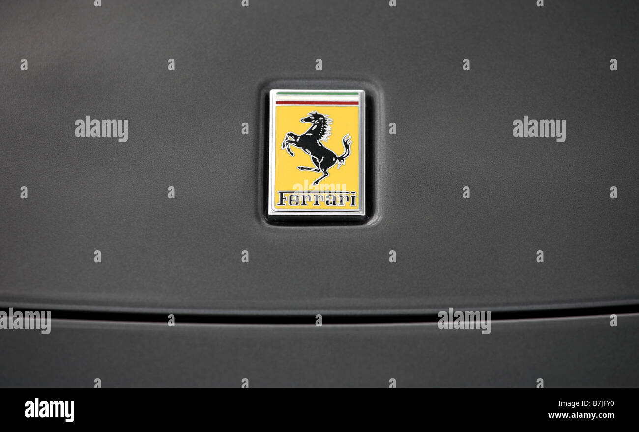 Ferrari bonnet badge on black car Stock Photo - Alamy