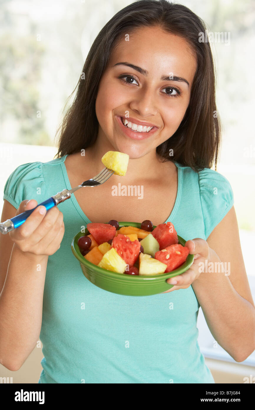 Teenage Girl Eating Fresh Fruit Salad Stock Photo - Alamy