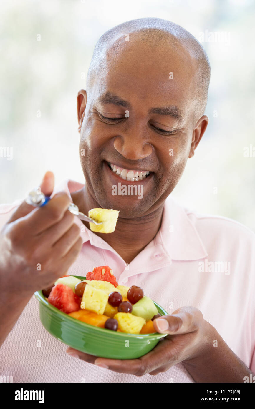 Older person enjoying fresh fruit hi-res stock photography and images ...