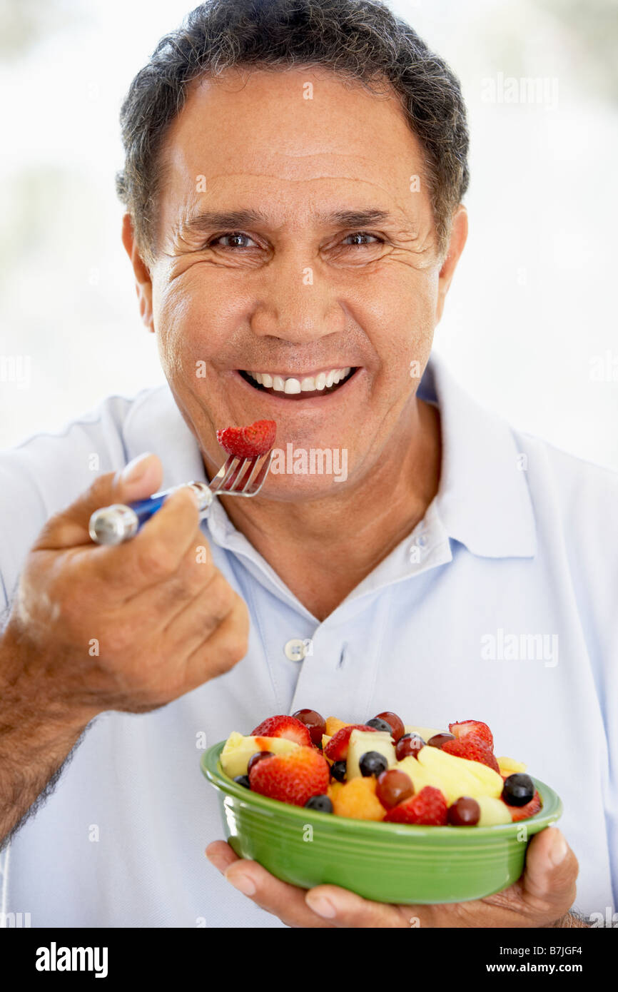 Senior Man Eating Fresh Fruit Salad Stock Photo - Alamy Senior Man Eating Fresh Fruit Salad Stock Photo - Alamy