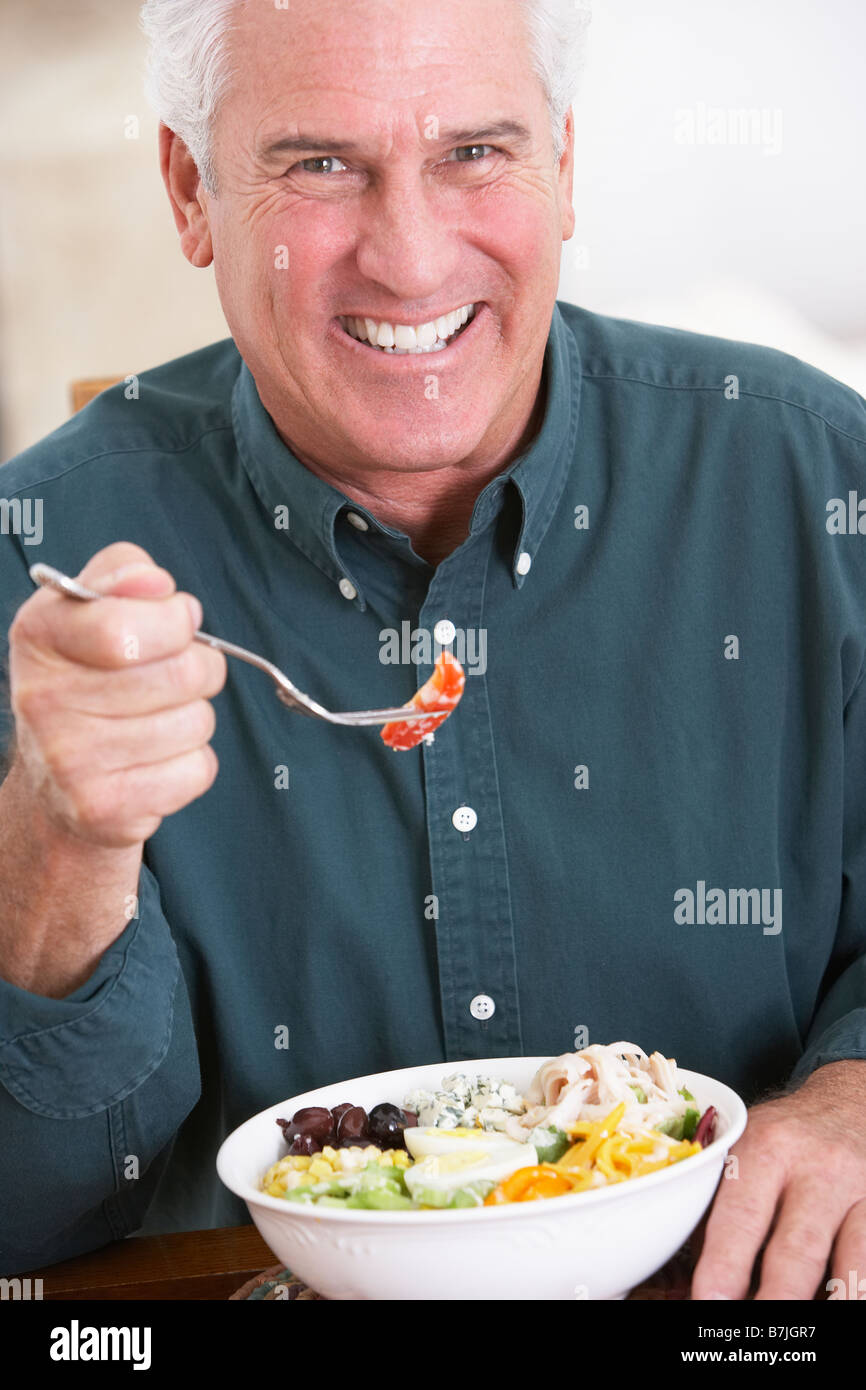 Senior Man Eating A Healthy Meal Stock Photo - Alamy