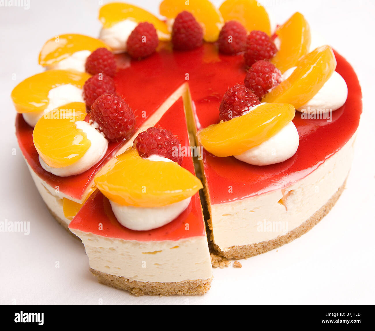 Raspberry & Mandarin cheesecake Stock Photo - Alamy