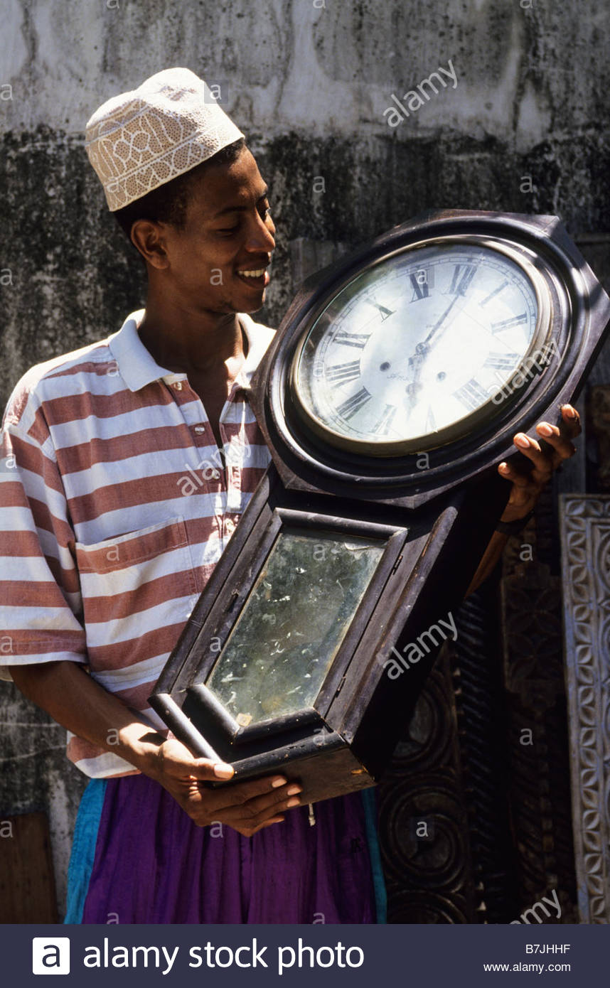 Man With Pendulum Clock Stock Photos & Man With Pendulum Clock Stock ...